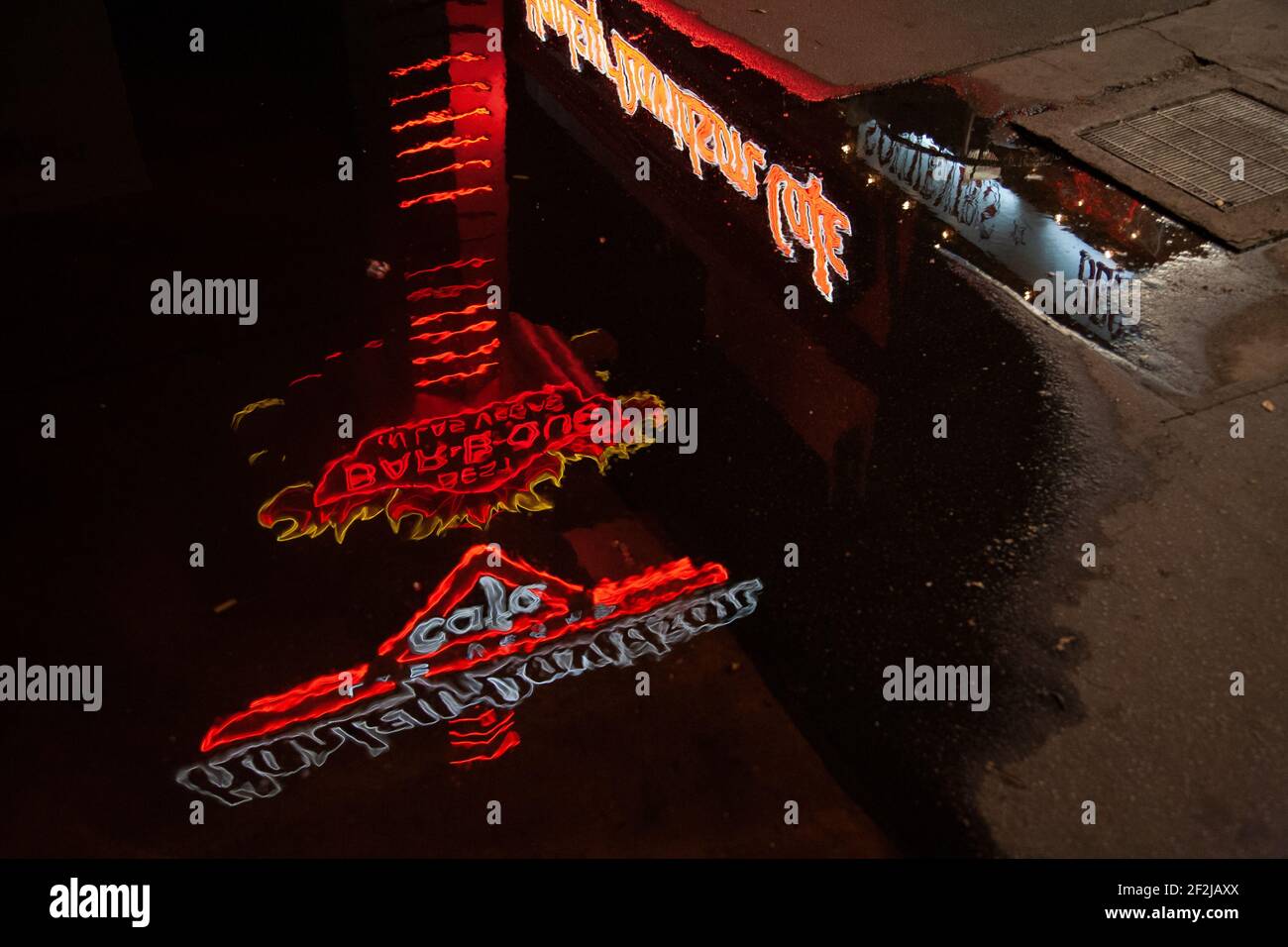 Reflection of an illuminated sign in a puddle in Las Vegas Stock Photo ...