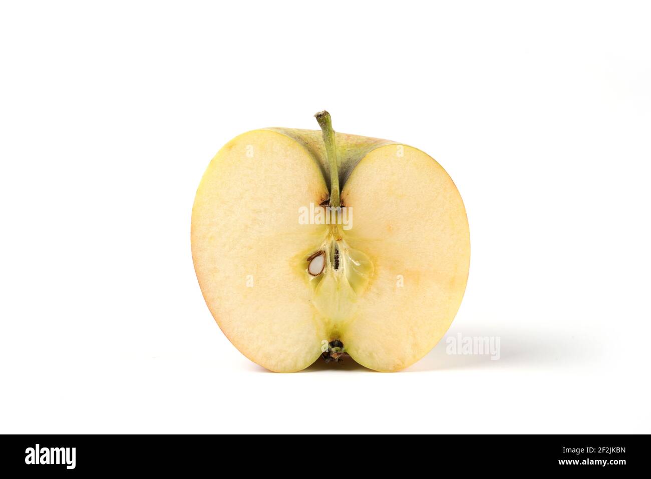 Half cut apple isolated on white background Stock Photo - Alamy