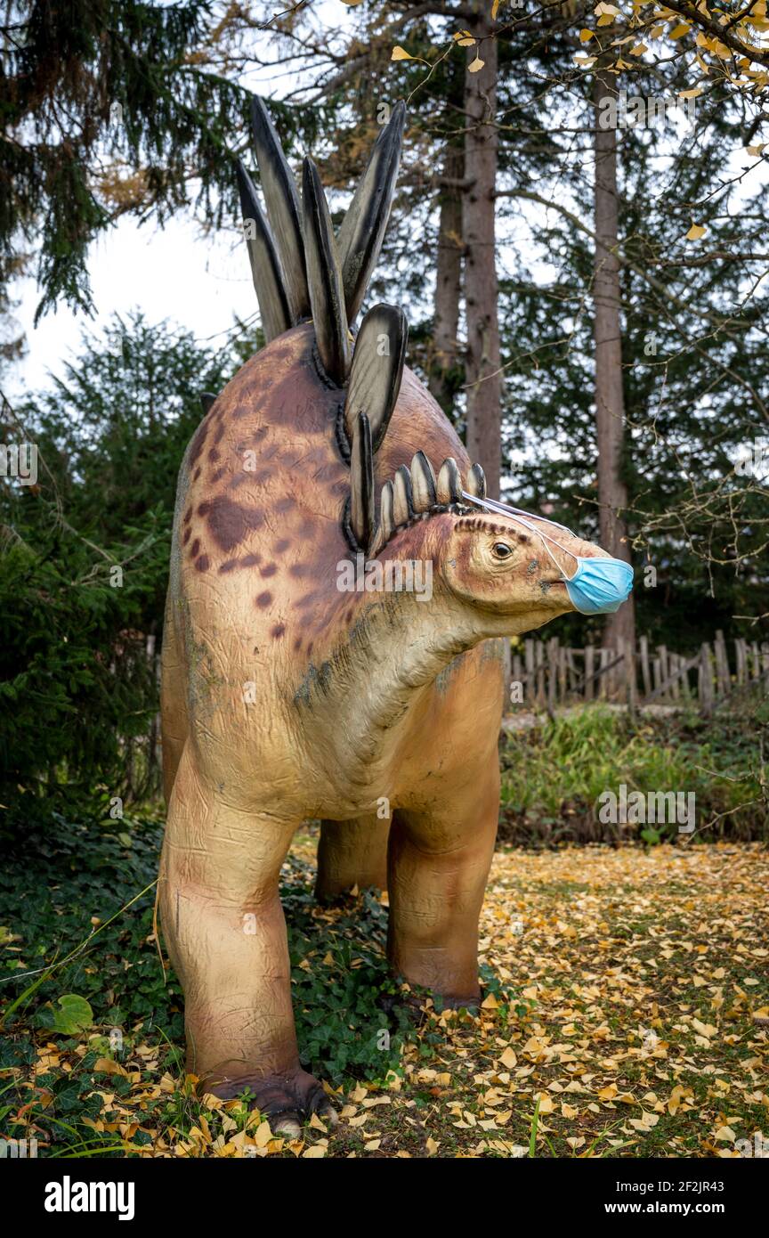 Dinosaur Stegosaurus with mouth and nose protection, Dinopark of the ...