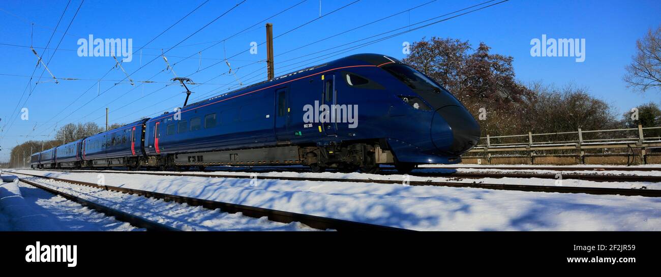 Class 802, Hull Trains Azuma train in snow, East Coast Main Line ...