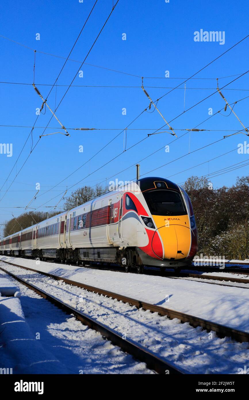 Class 800, LNER Azuma train in snow, East Coast Main Line Railway ...