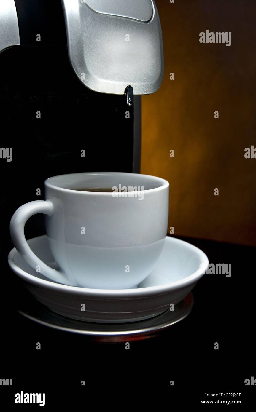 Modern Coffee Machine with White Coffee Cup Vertical Stock Photo - Alamy