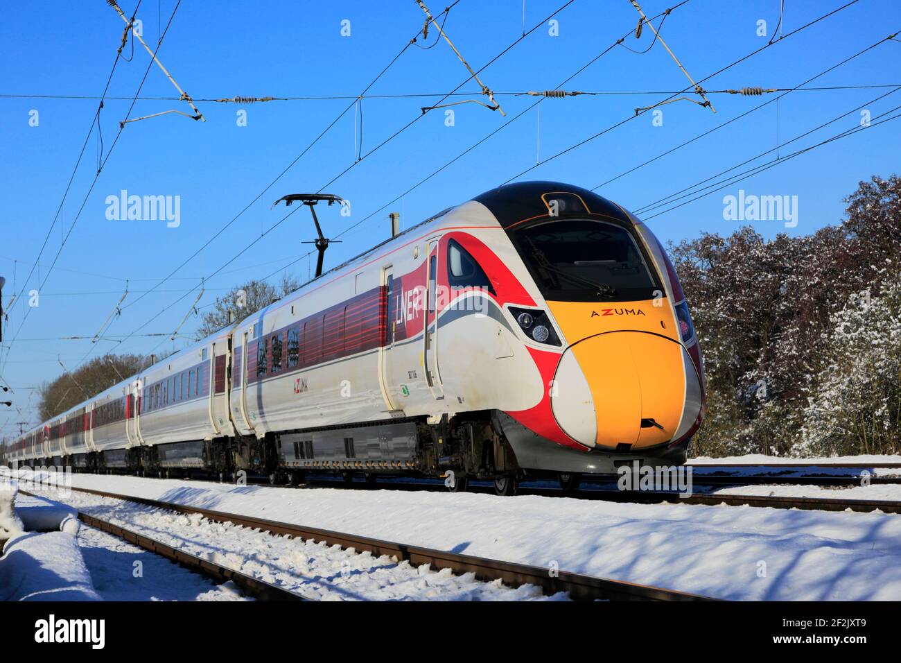 Class 800, LNER Azuma train in snow, East Coast Main Line Railway, Peterborough, Cambridgeshire ...