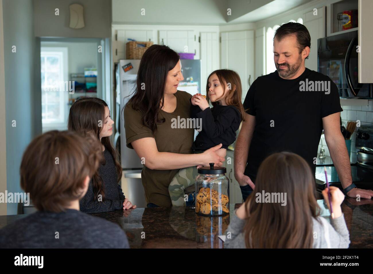 Family hanging out in home hi-res stock photography and images - Alamy