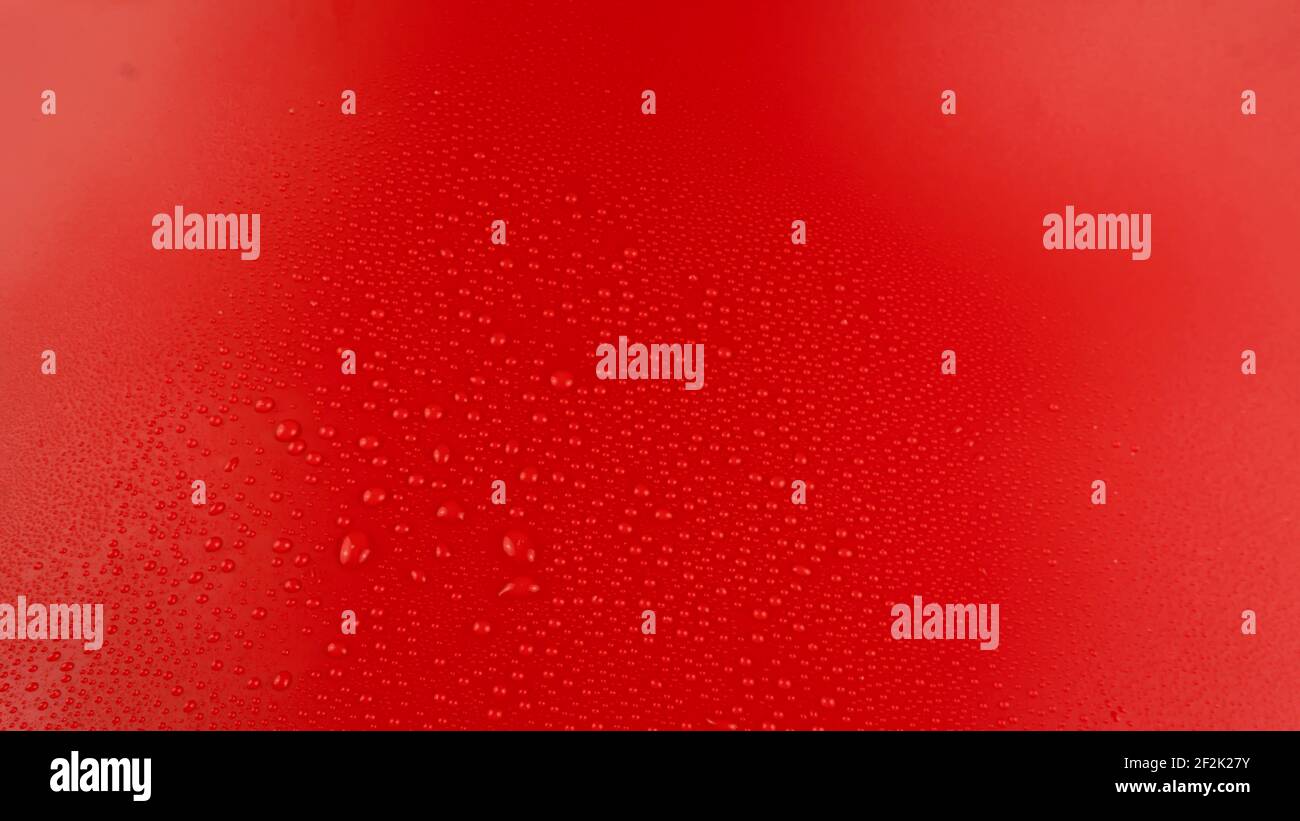 Waterdrops on a red background. Background. Water drops Stock Photo - Alamy