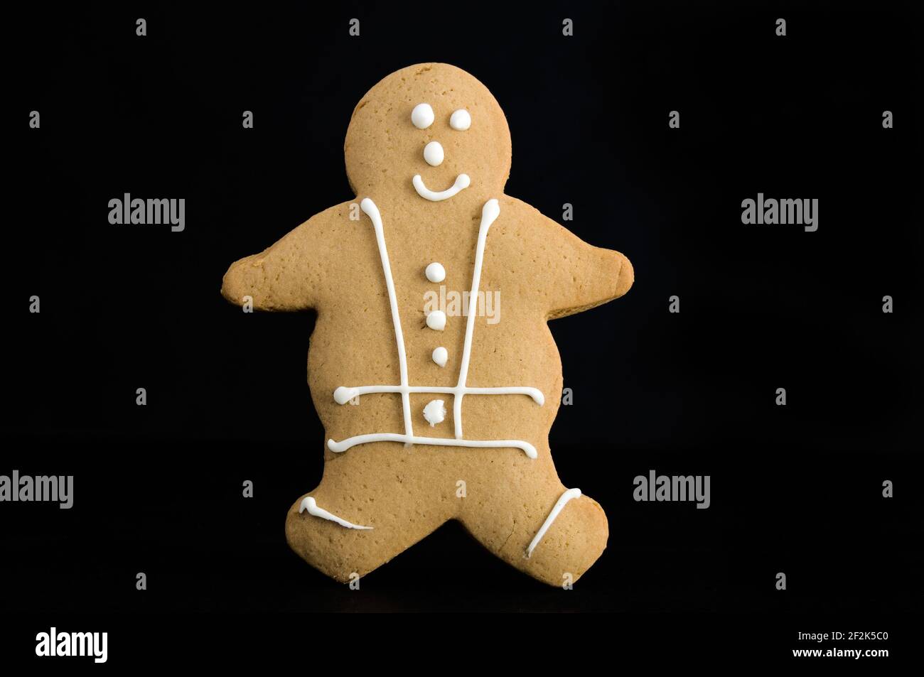 Beautiful and Delicious Gingerbread Man Standing Up on Black Background ...