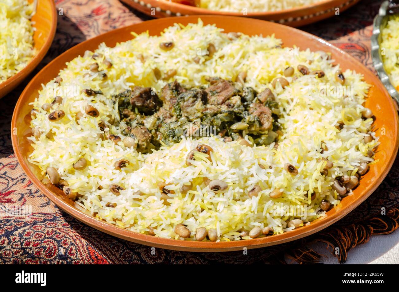 Traditional caucasian rice dish plov with sultana and other dry fruits ...