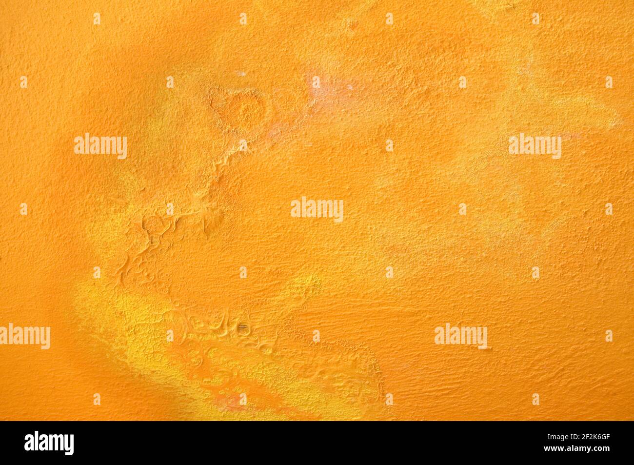 Textured Background of Yellow Cracking Paint on a Concrete Wall ...