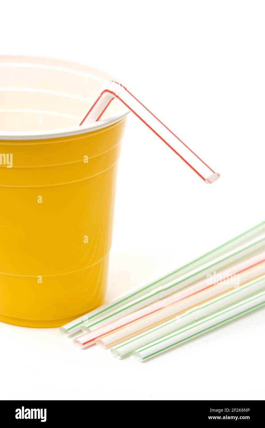 Yellow Plastic Cup and Plastic Straw for Recycling Isolated on a White ...