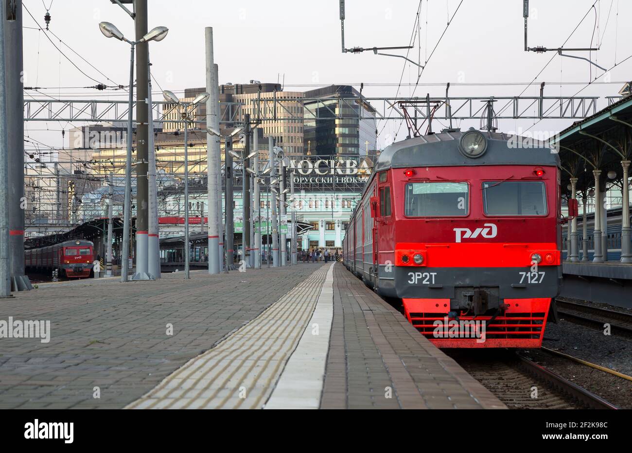 Train on Moscow passenger platform at night (Belorussky railway station ...