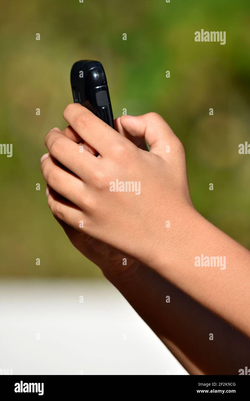A Hand With Mobile Phone Stock Photo - Alamy