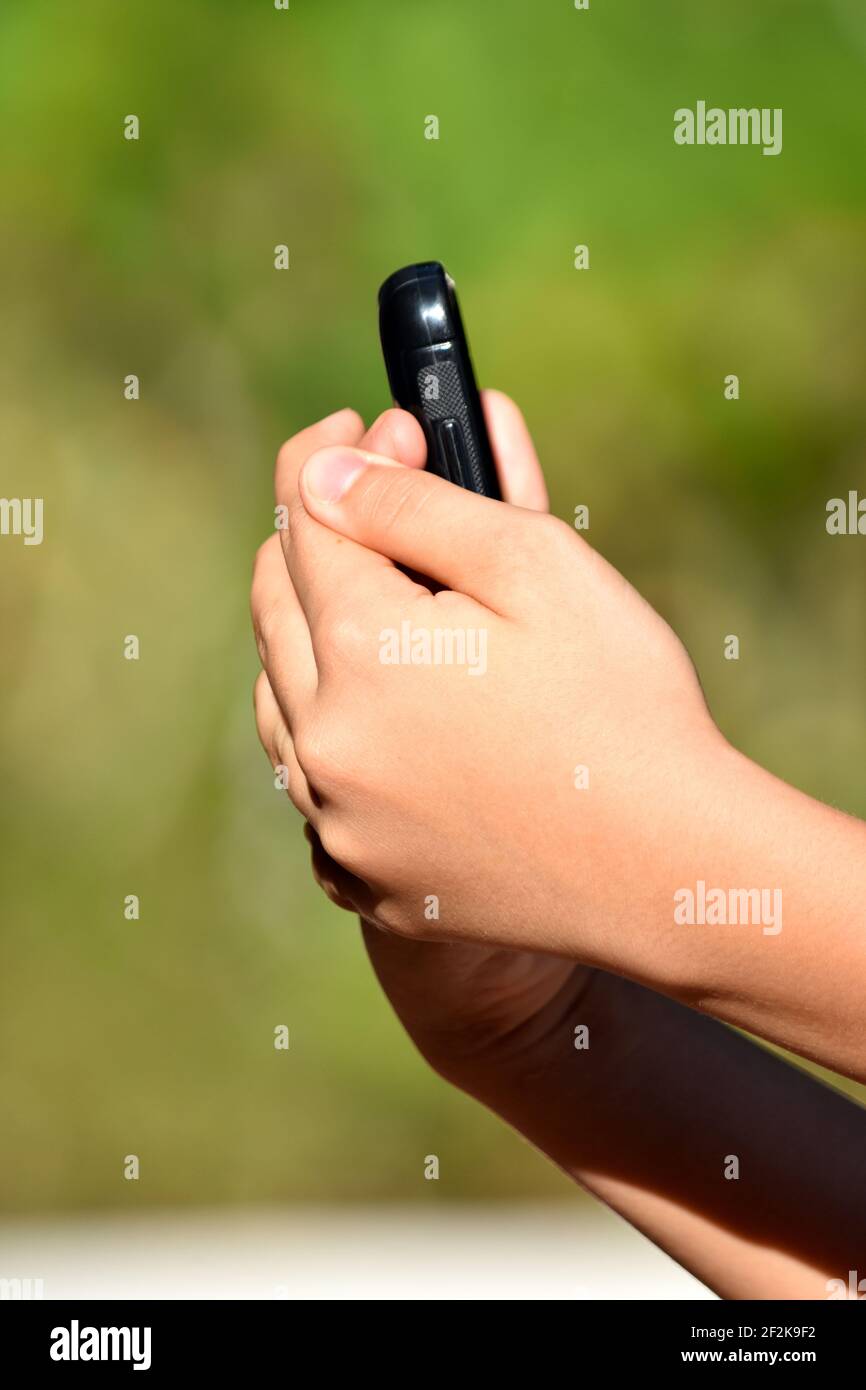 A Hand Holding Mobile Phone Stock Photo - Alamy