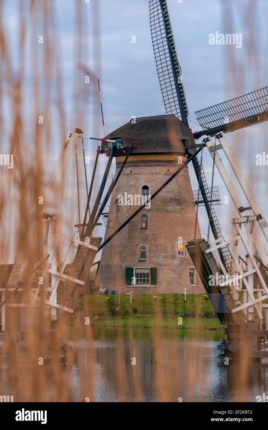 Dramatic cloudy sky over the famous Windmills in Kinderdijk Holland ...
