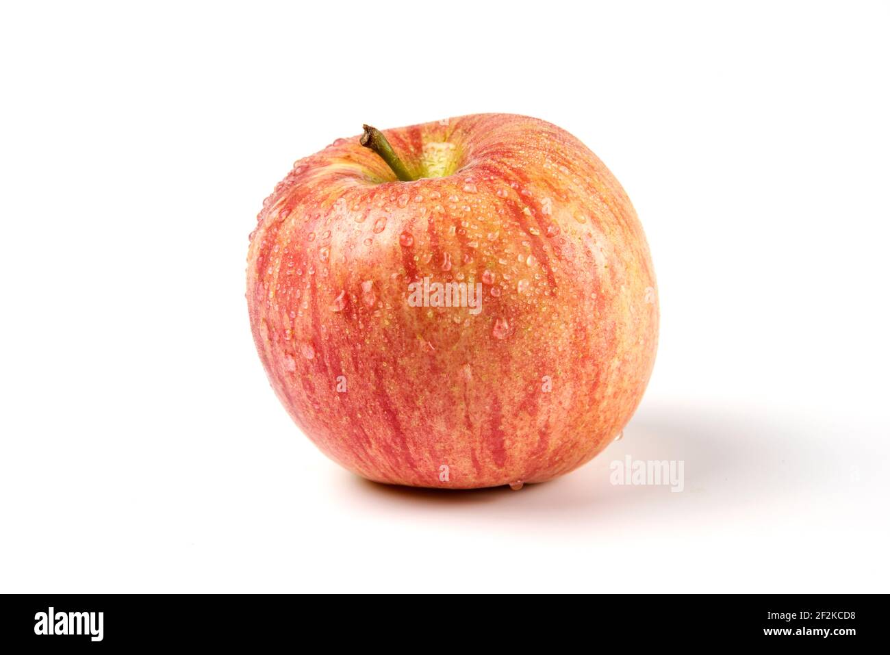 A single whole red apple on white Stock Photo - Alamy