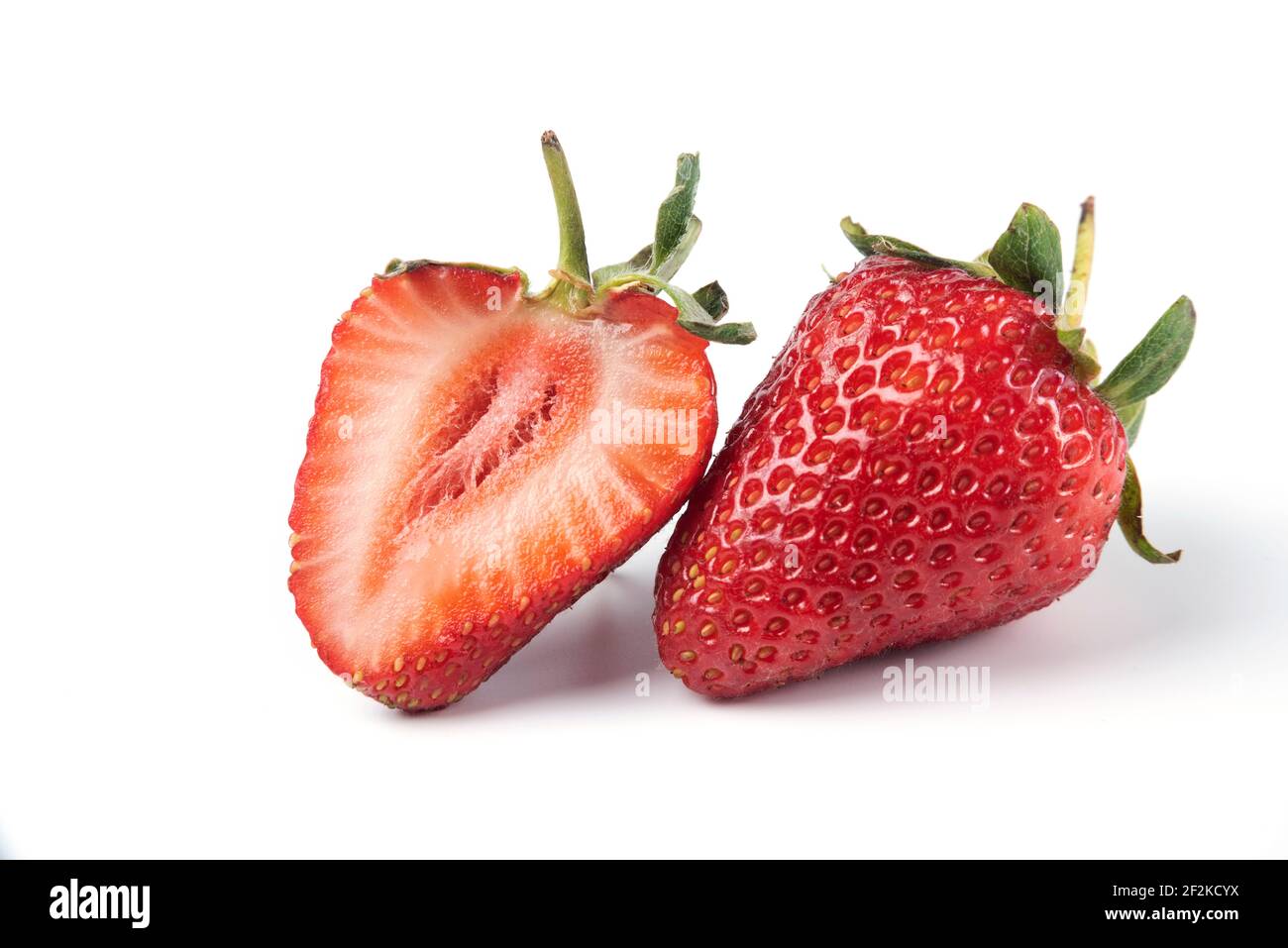 Red strawberries isolated on white background zoom Stock Photo - Alamy