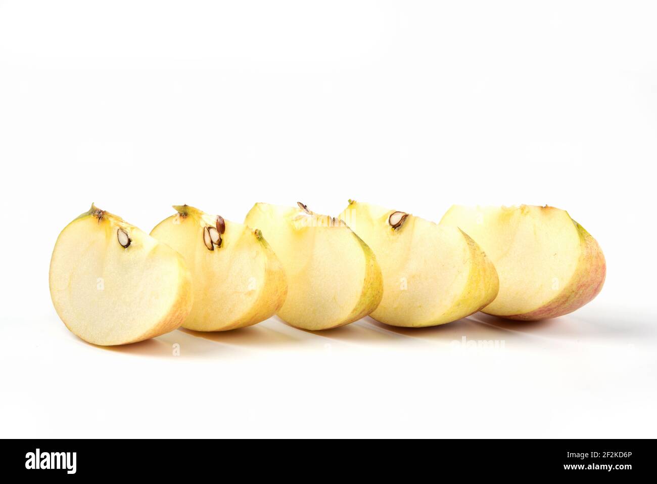Apple slices isolated on white background zoom Stock Photo - Alamy