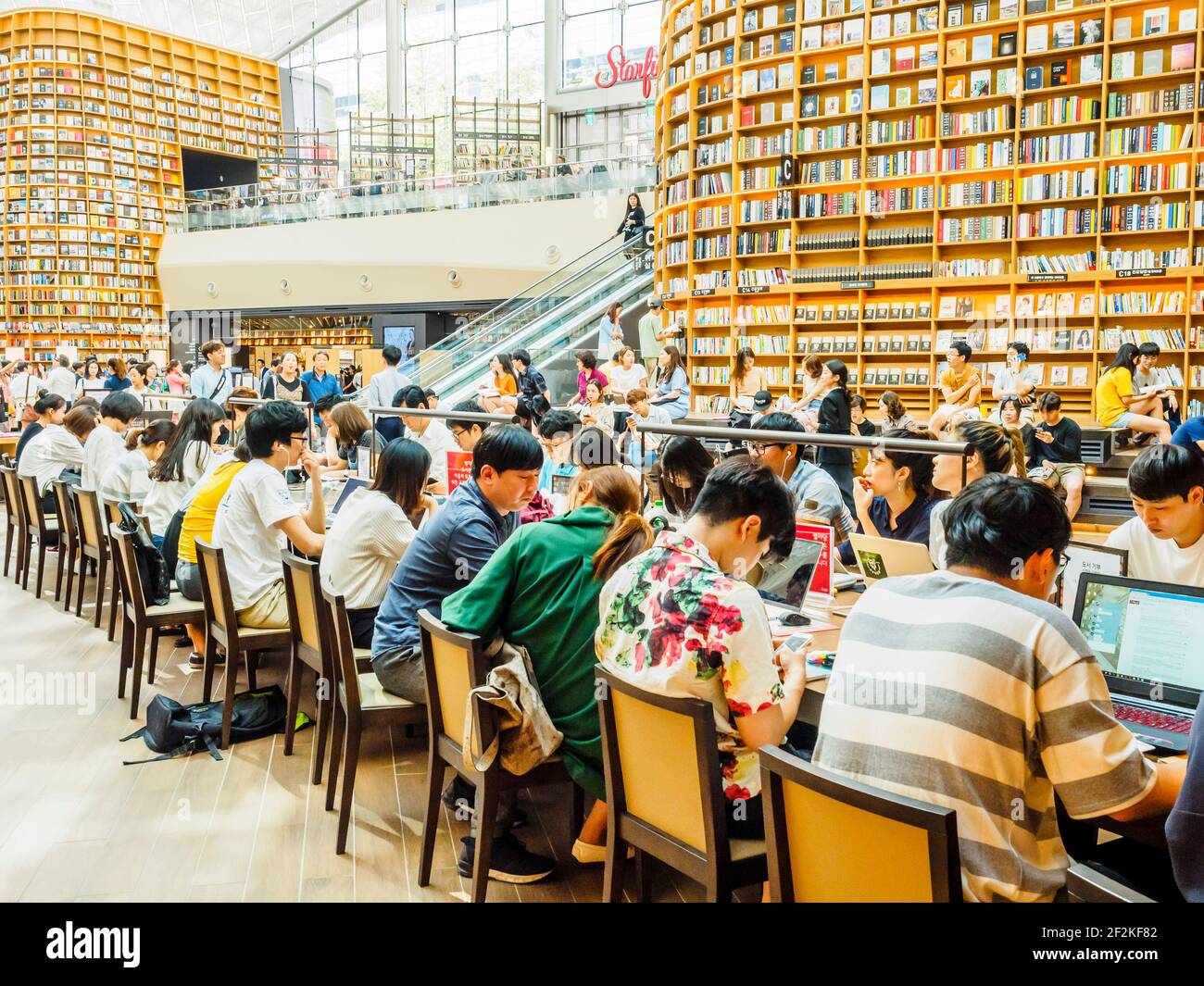 Seoul, South Korea - June 22, 2017: People sitting and reading books in ...