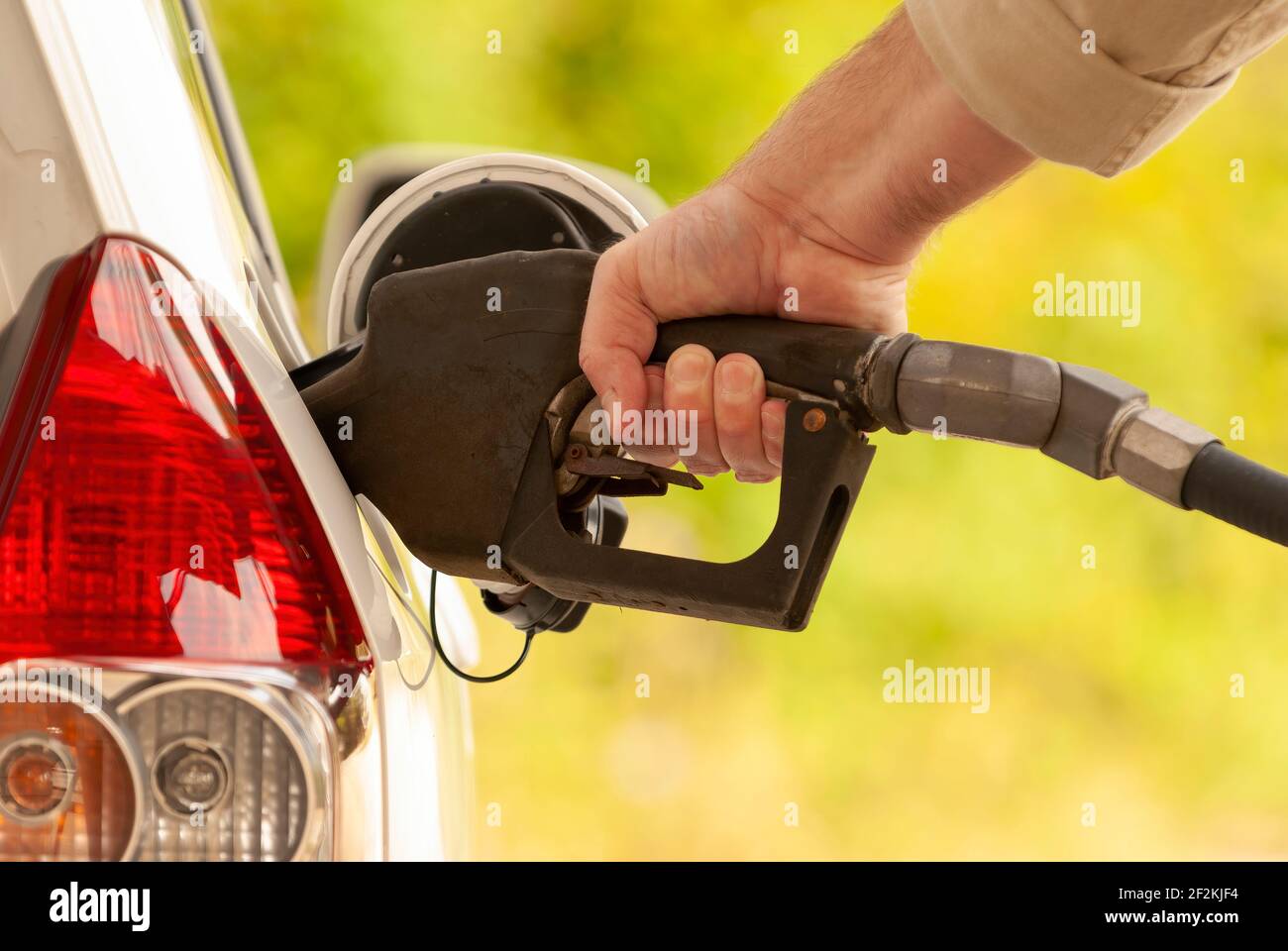 Black hand pumping gas hi-res stock photography and images - Alamy
