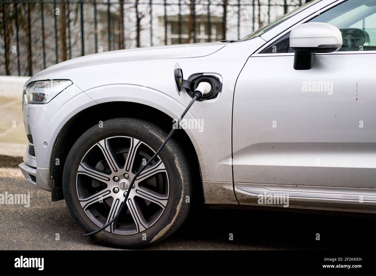 A Volvo electric car plugged into an Ubitricity lamppost EV charging ...