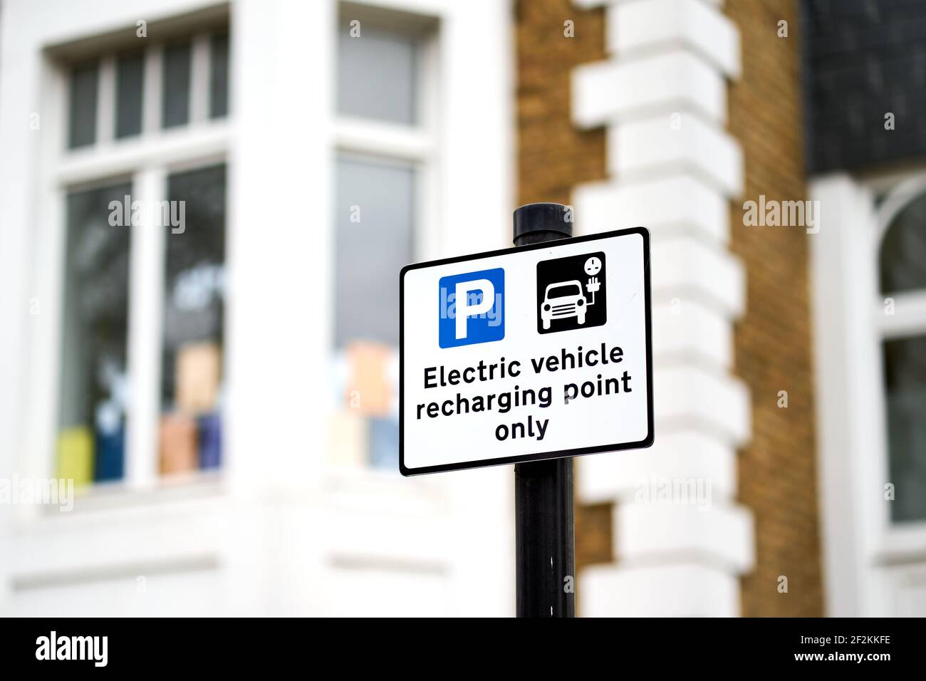 Electric vehicle signage indicating Source London EV charging station ...