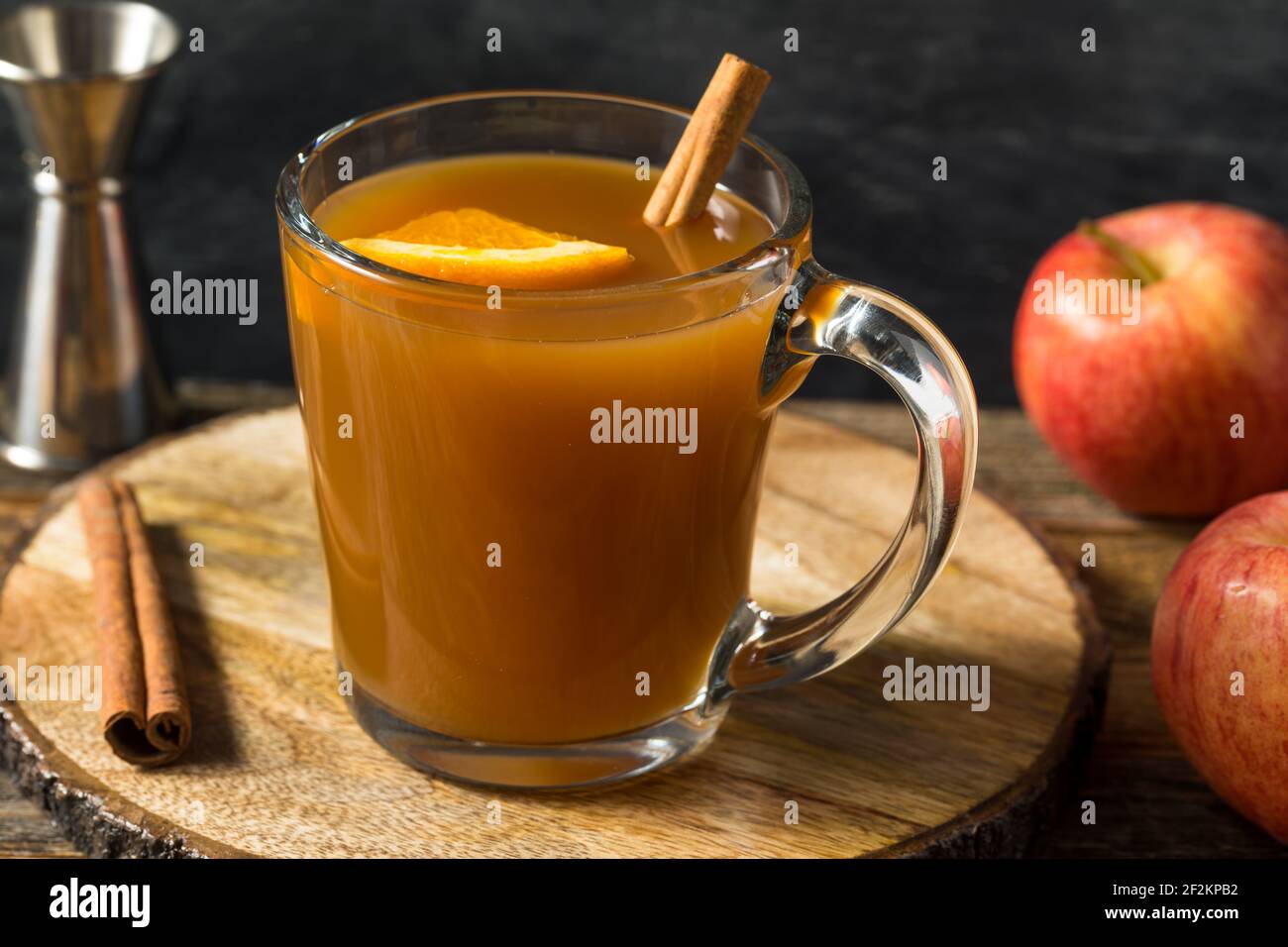 Boozy Warm Apple Cider Cocktail with Whiskey and Orange Stock Photo - Alamy
