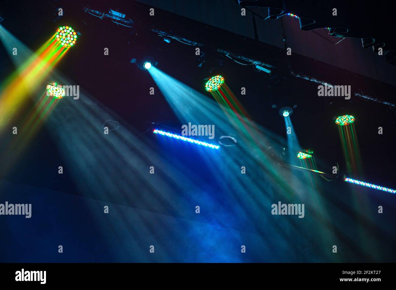 Multi color light on dark stage. Spotlights Stock Photo - Alamy