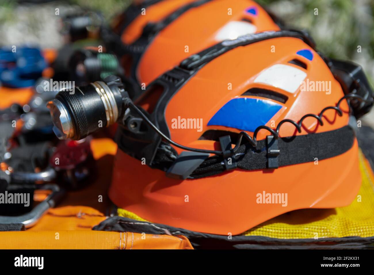 The firefighters recast helmets with a flashlight Stock Photo - Alamy