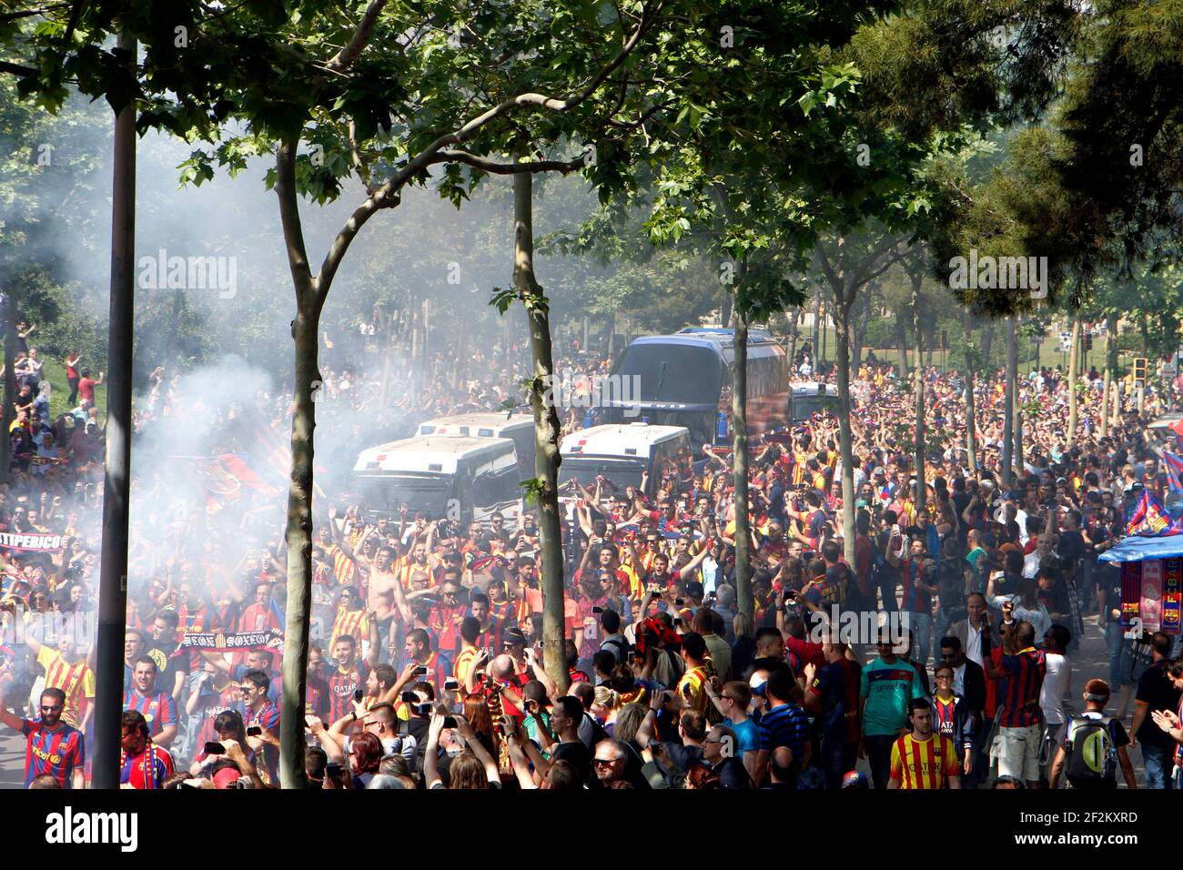 Fans show their support as the bus of FC Barcelona arrives prior to the ...