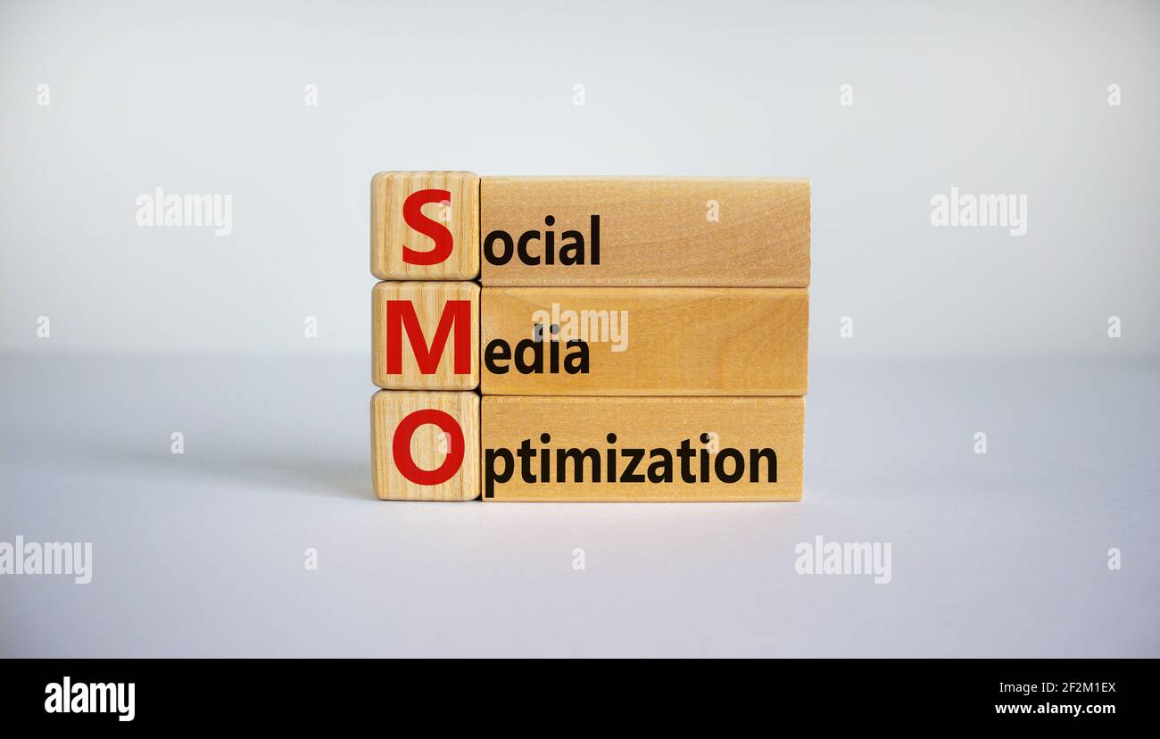 SMO, social media optimization symbol. Wooden cubes and blocks with ...
