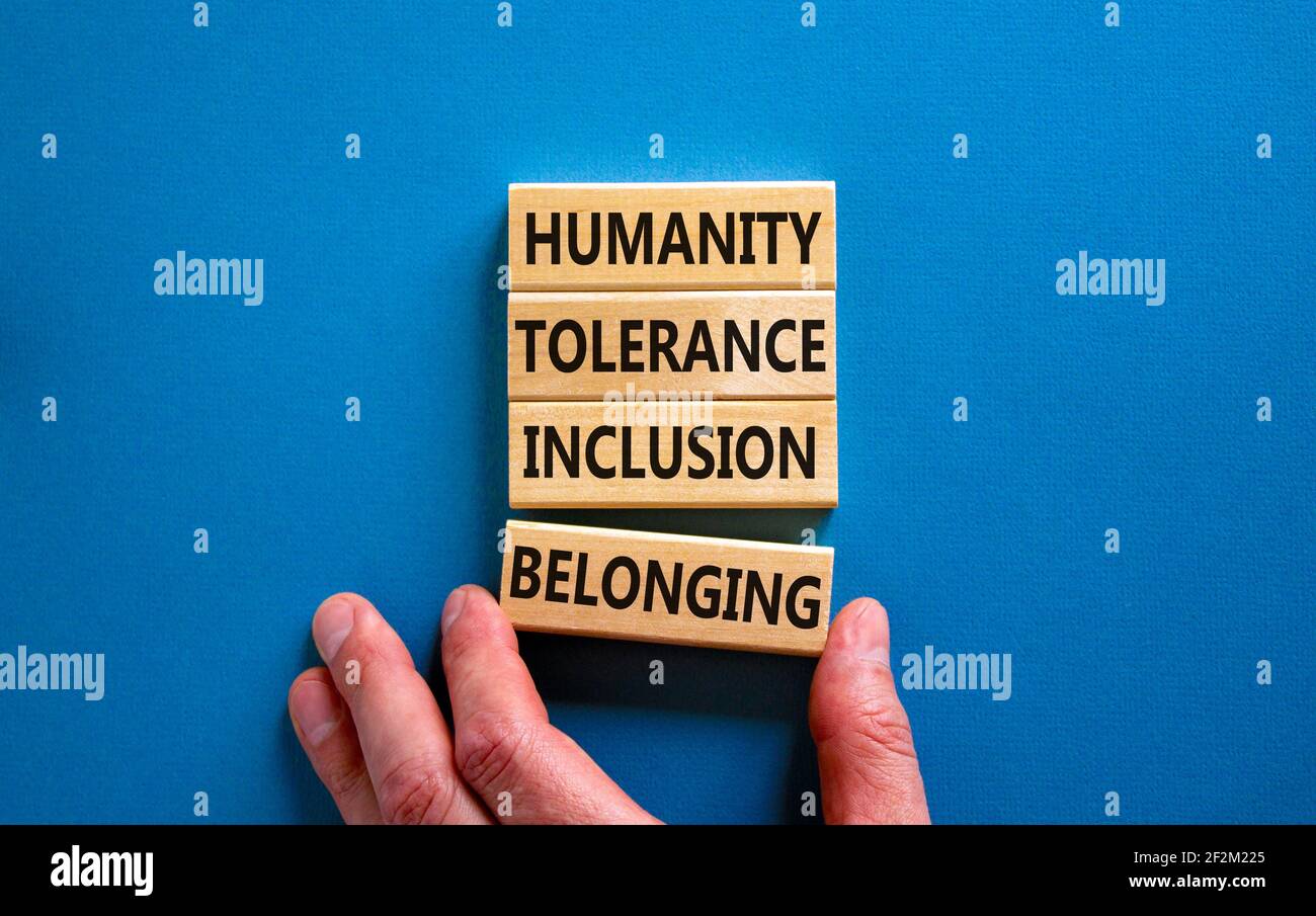 Humanity, tolerance, inclusion, belonging symbol. Wooden blocks with ...