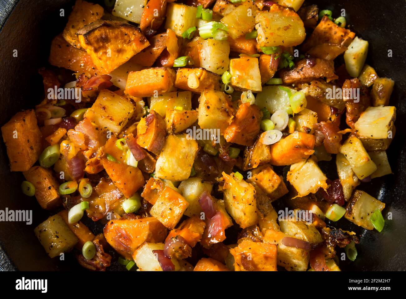 Homemade Healthy Sweet Potato Hash with Fried Eggs Stock Photo - Alamy
