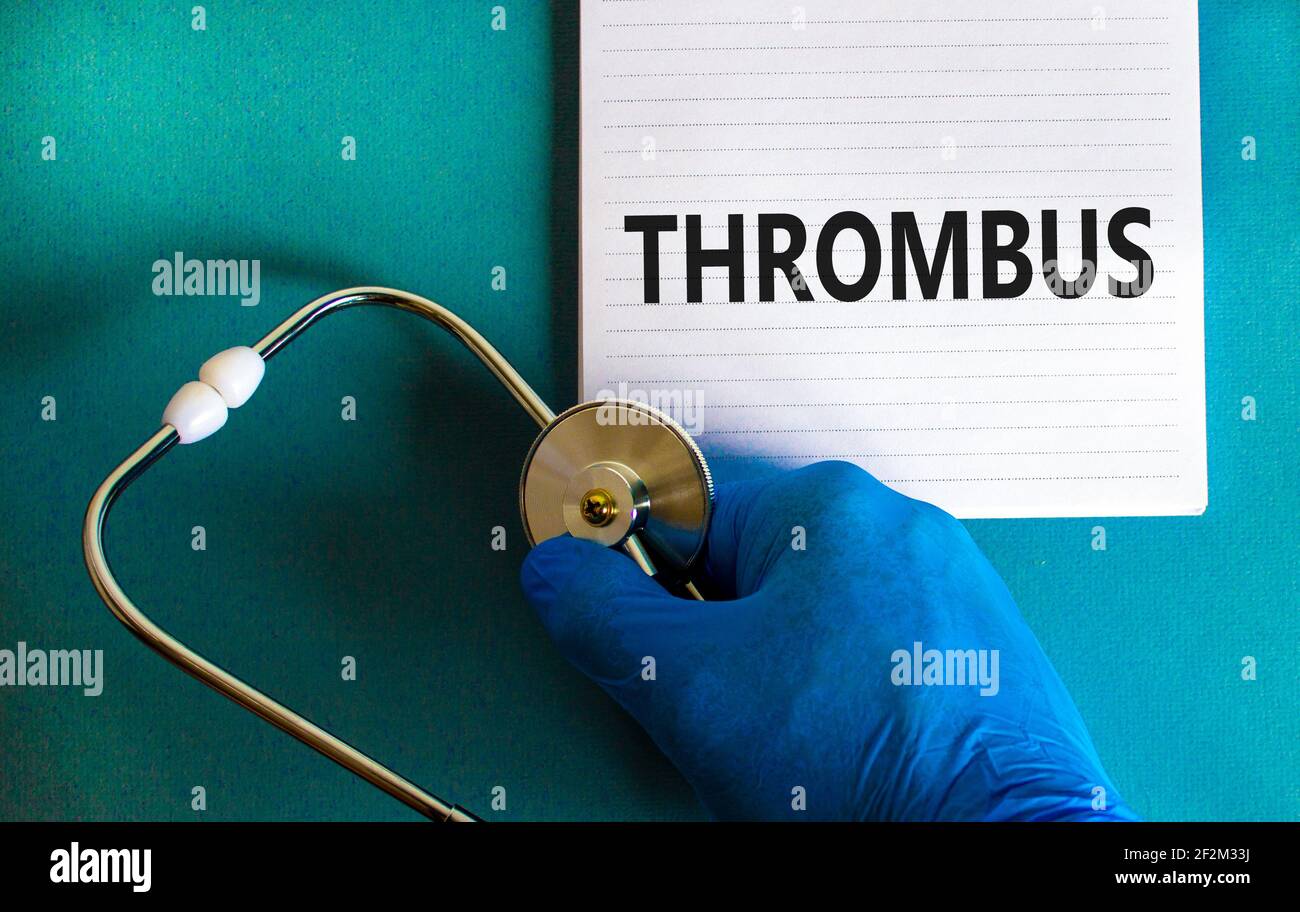 Medical and thrombus symbol. Doctor hand, stethoscope. White note with ...