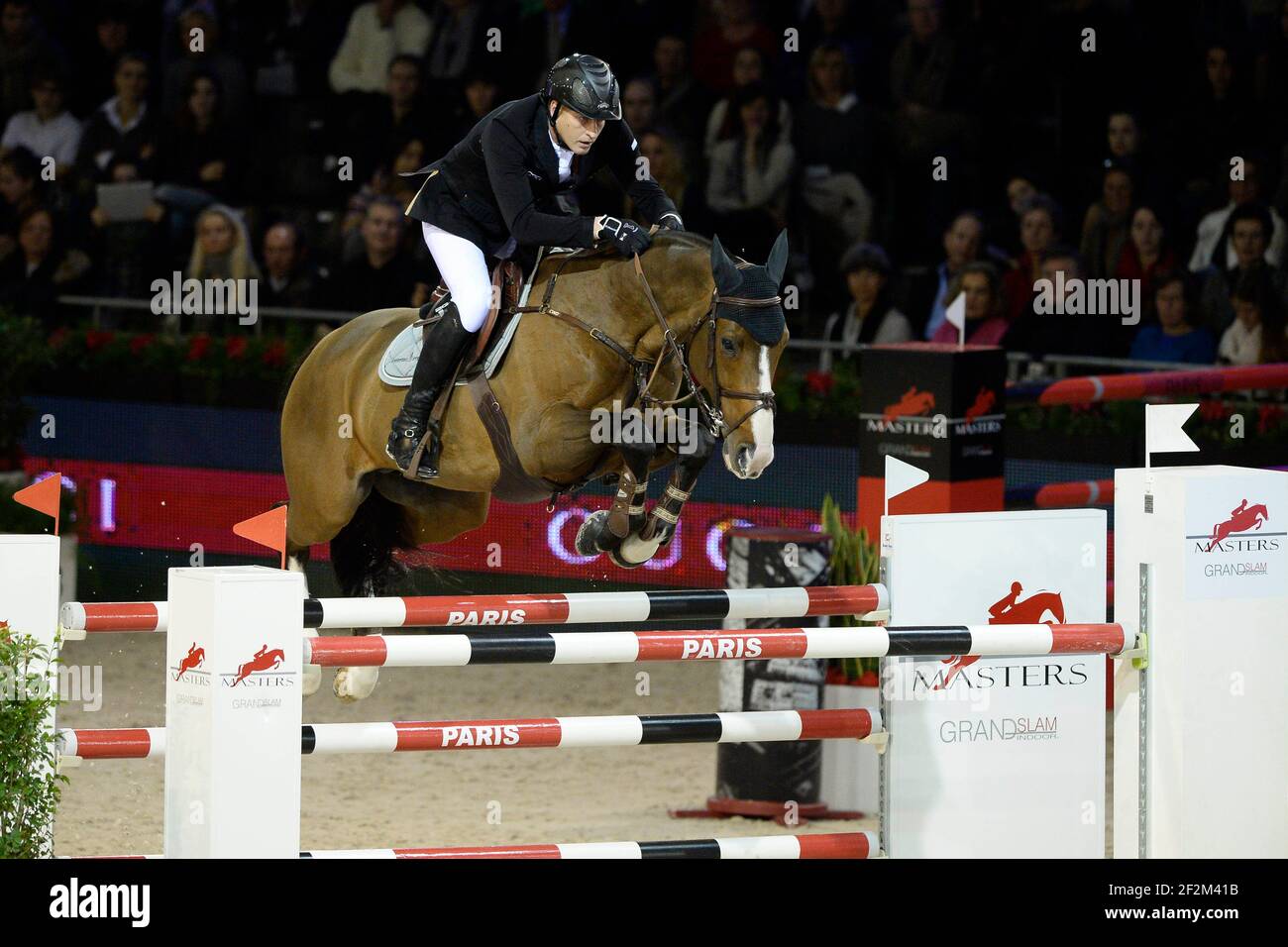 Marc Houtzager (Ned) riding on Sterrehof s Opium during the Gucci Paris ...