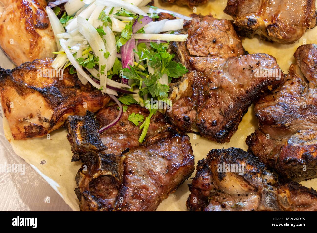 Grilled meat shashlik with spice. The Caucasian shish kebab. Juicy ...