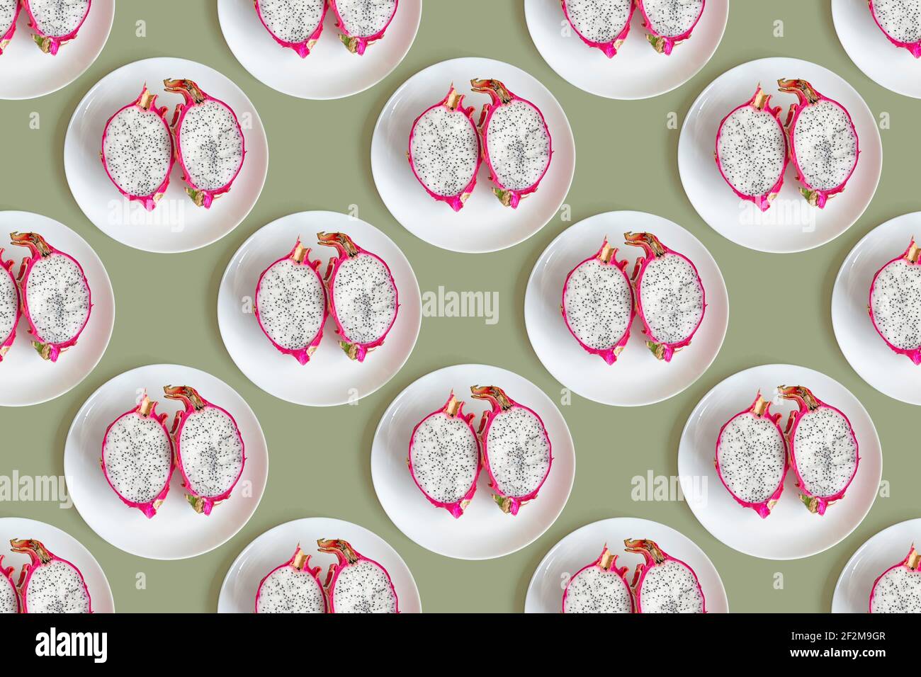 Dragon fruit seamless pattern pitahaya. Half sliced pitaya on a plate ...