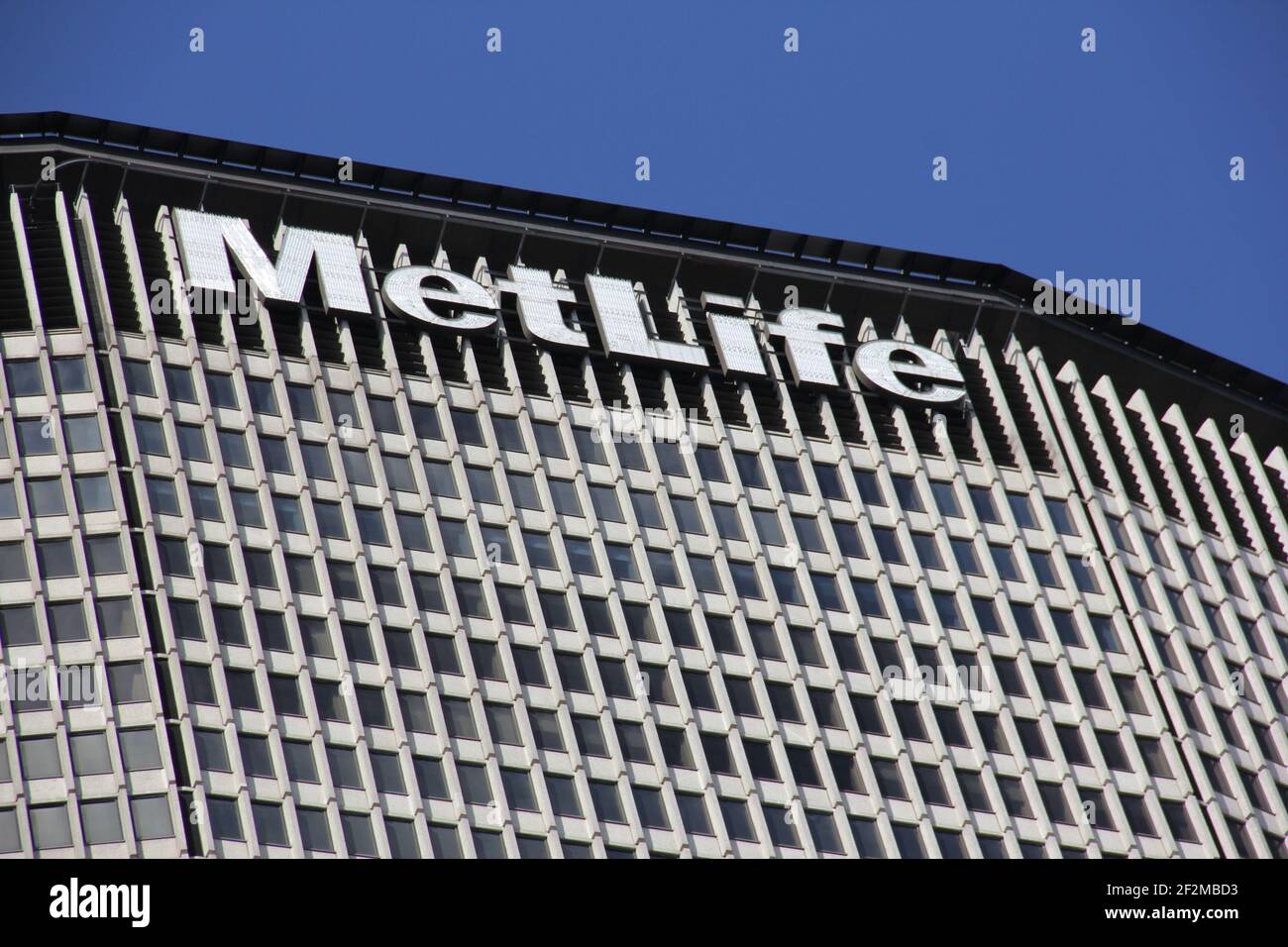 The sign on the facade of the MetLife building, iconic skyscraper at ...
