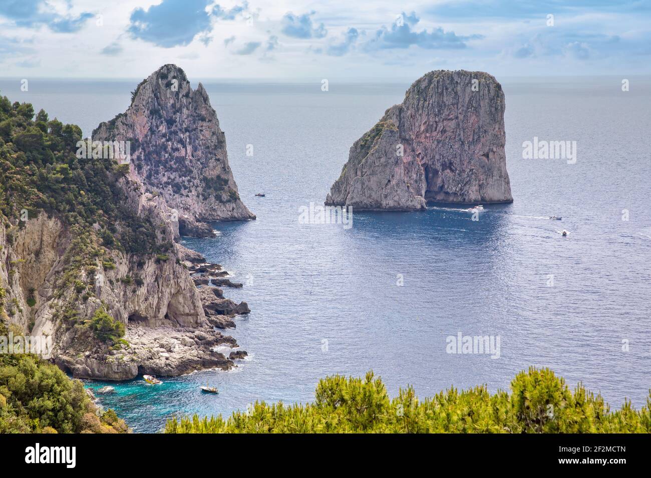 View of the famous Faraglioni Rocks. Capri coast view with the ...