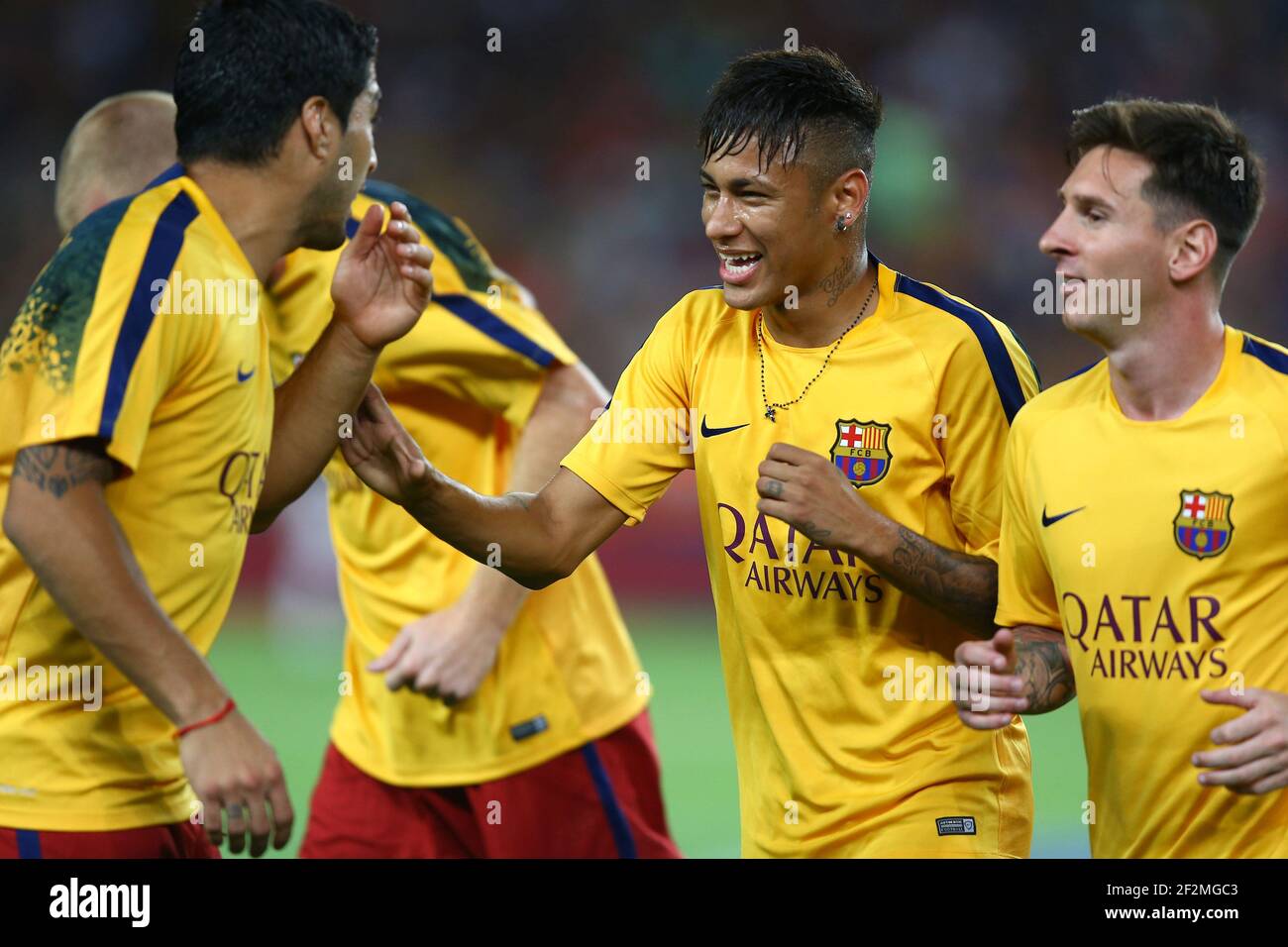 Neymar of FC Barcelona shares a joke with Lionel Messi and Luis Suarez ...