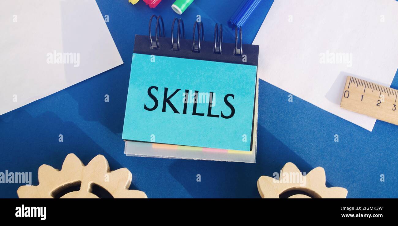 Notes with the word Skills on a blue background. Knowledge and skill ...