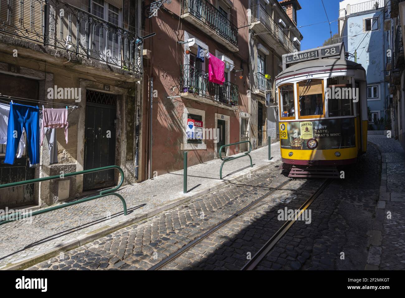 Icon of Lisbon - old yellow tram Stock Photo - Alamy