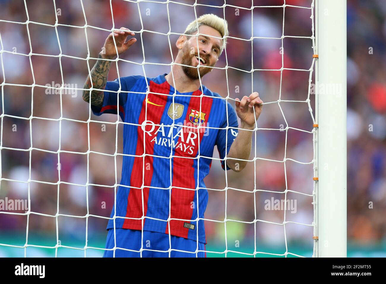 Lionel Messi of FC Barcelona reacts after missing a chance to score ...