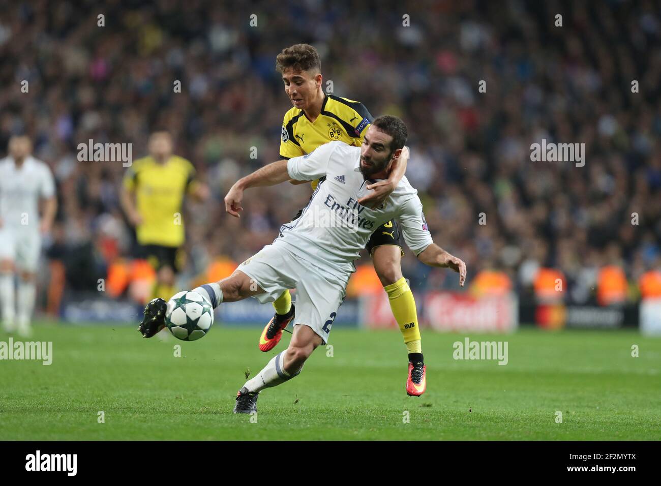 Daniel Carvajal of Real Madrid duels for the ball with Emre Mor of ...