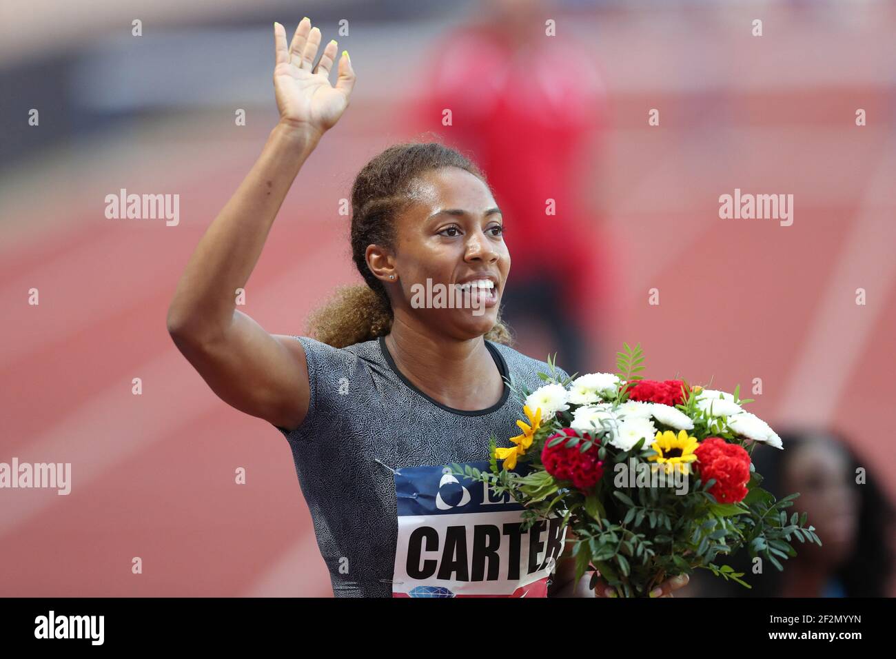 Kori Carter of USA celebrates victory during the 400m hurdles of the ...