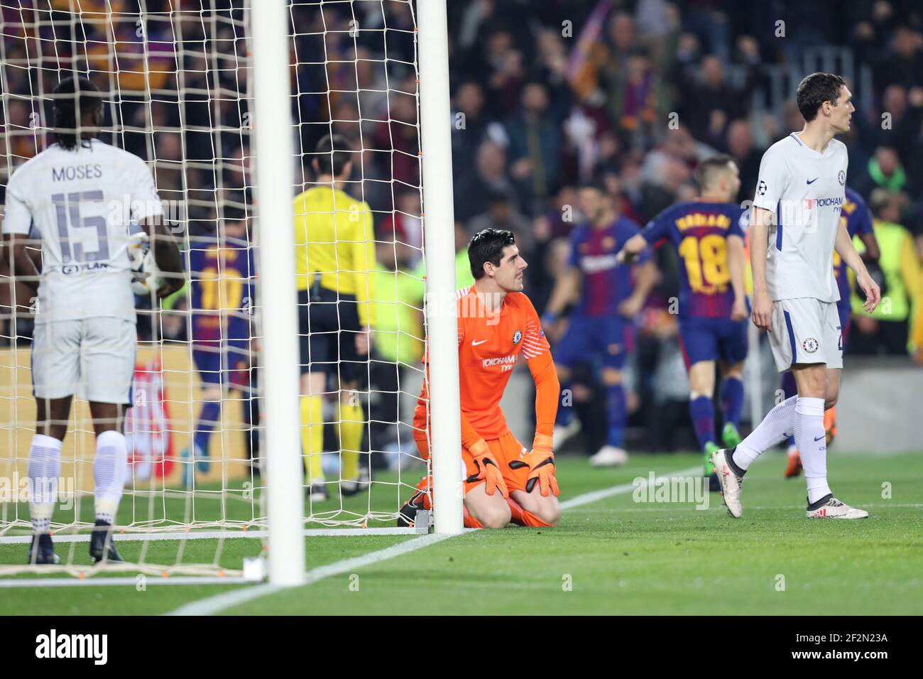 THIBAUT COURTOIS of Chelsea FC looks dejected as Lionel Messi of FC ...