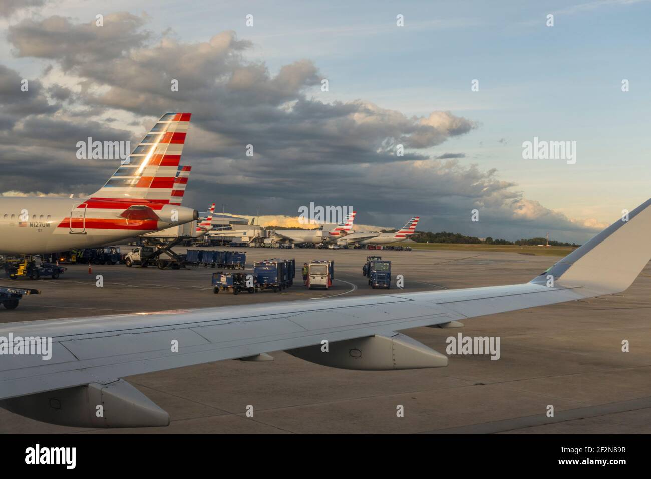 American Airlines planes lined up at the terminal at Charlotte Airport ...