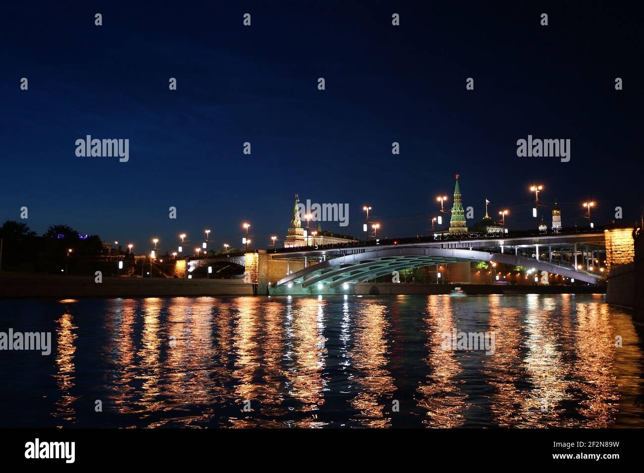 Russia, Moscow, night view of the Moskva River, the Great Stone Bridge ...
