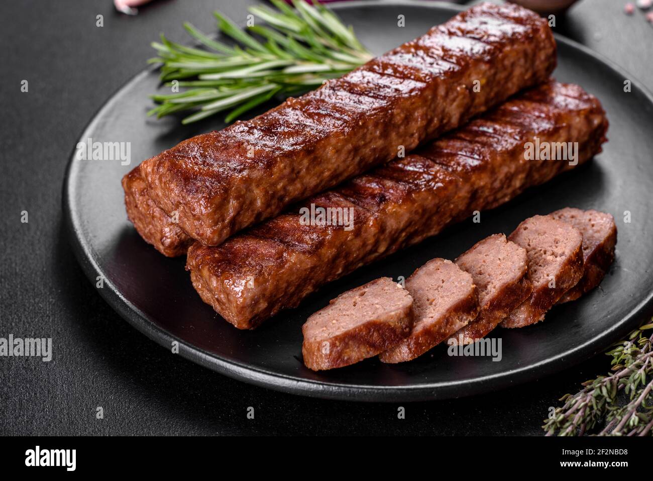 Fresh tasty kebab grilled with spices and herbs. Grilled meat dish ...