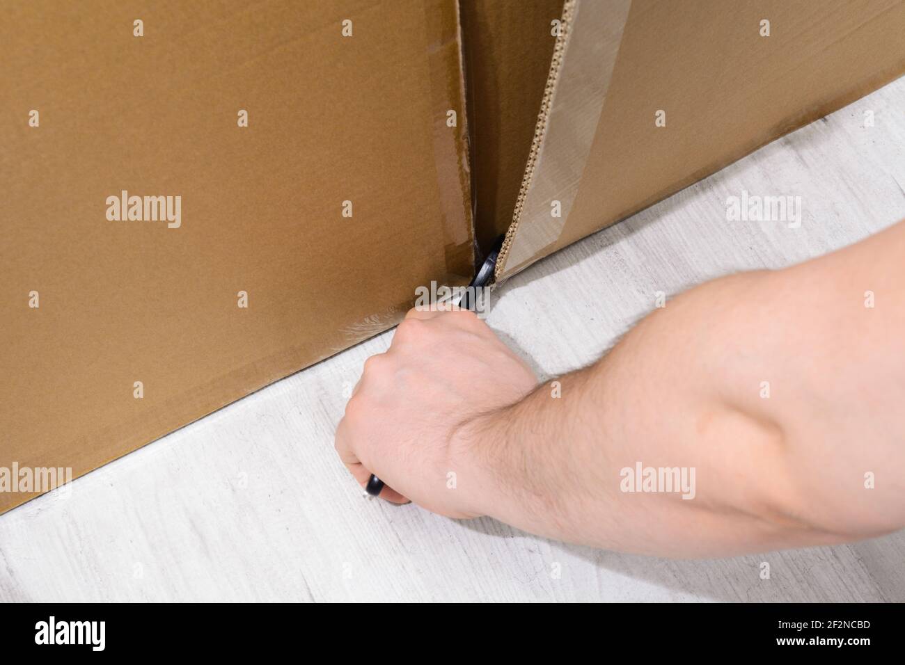 Cardboard cutter hi-res stock photography and images - Alamy