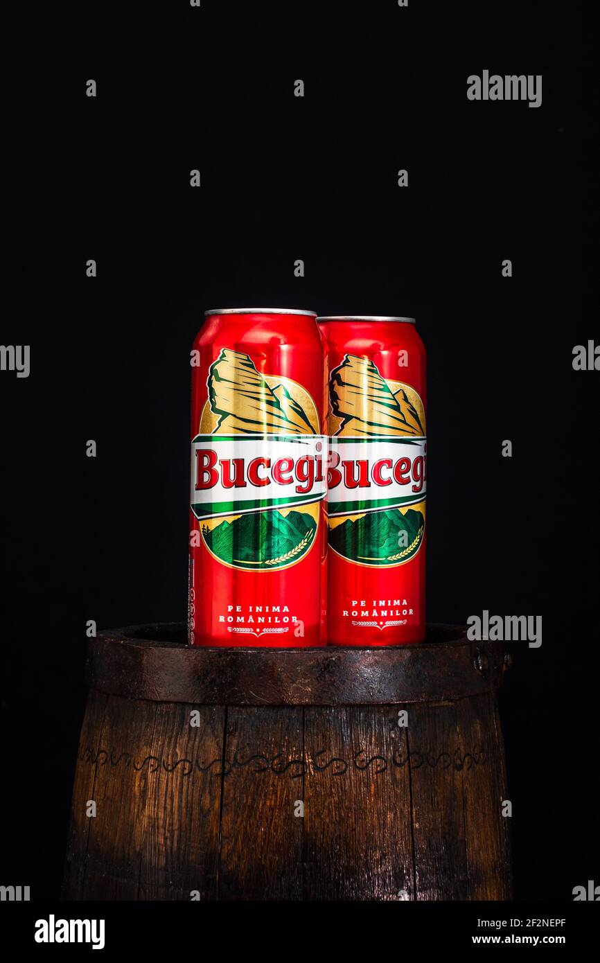 Can of Bucegi beer on beer barrel with dark background. Illustrative ...