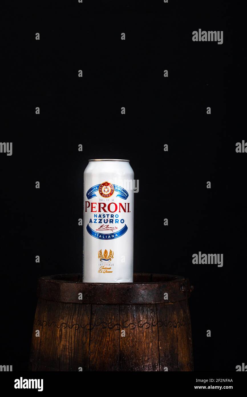 Can of Peroni beer on beer barrel with dark background. Illustrative ...